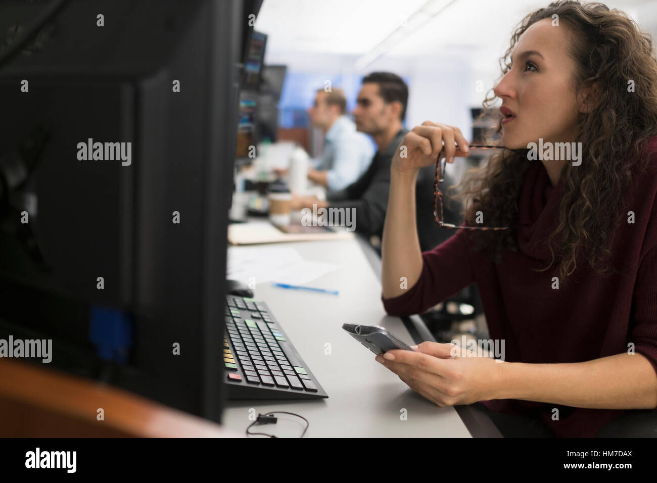 Stock market trader phone hi-res stock photography and images - Alamy