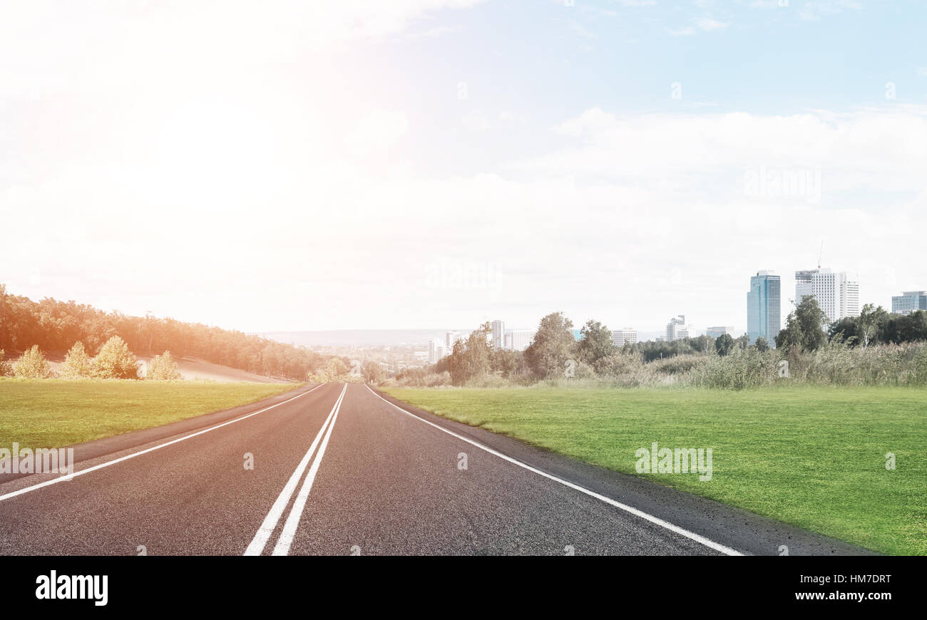 Road to big city Stock Photo - Alamy