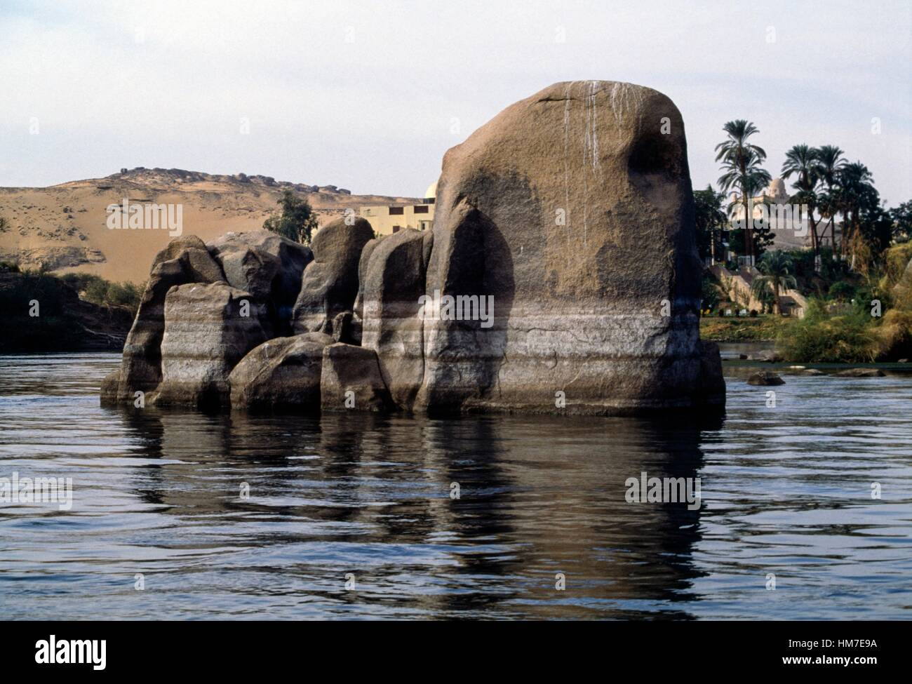 Rocks emerging from the Nile river near the first cataract, upstream of ...