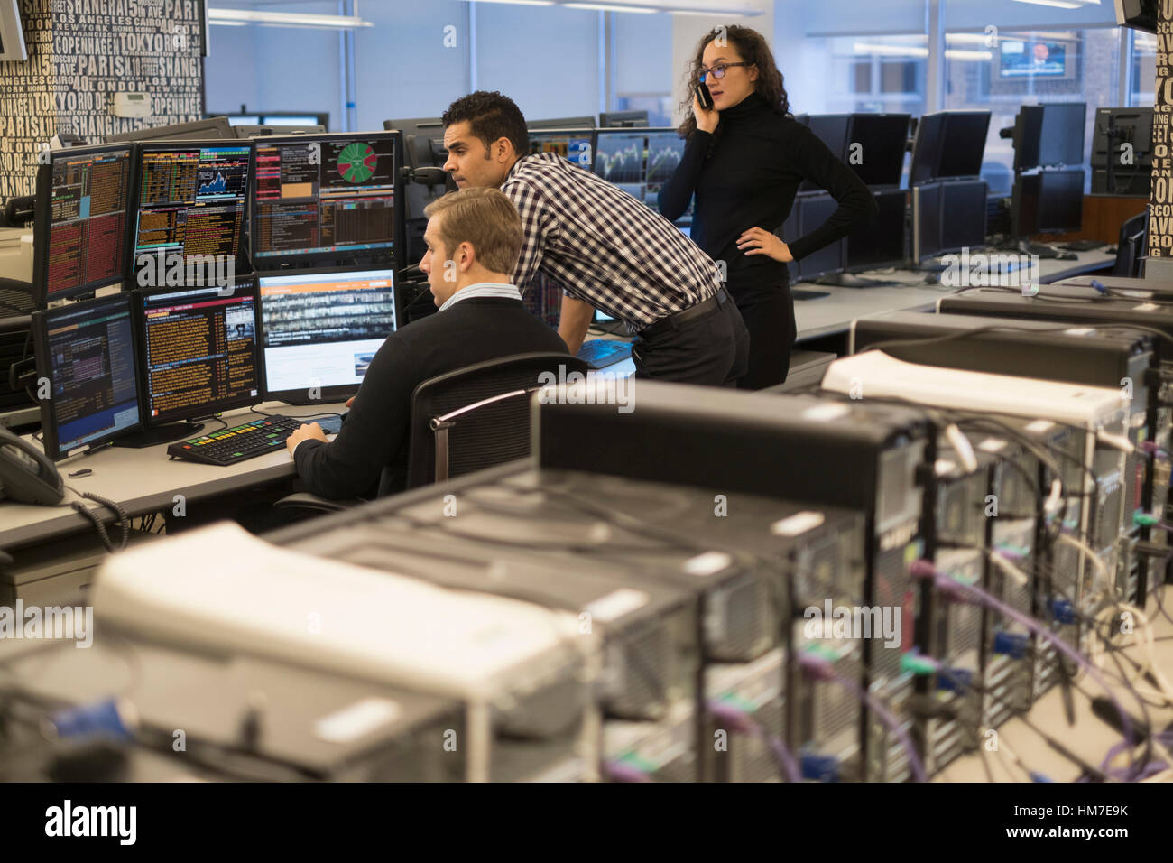 Young traders working in stock market Stock Photo - Alamy