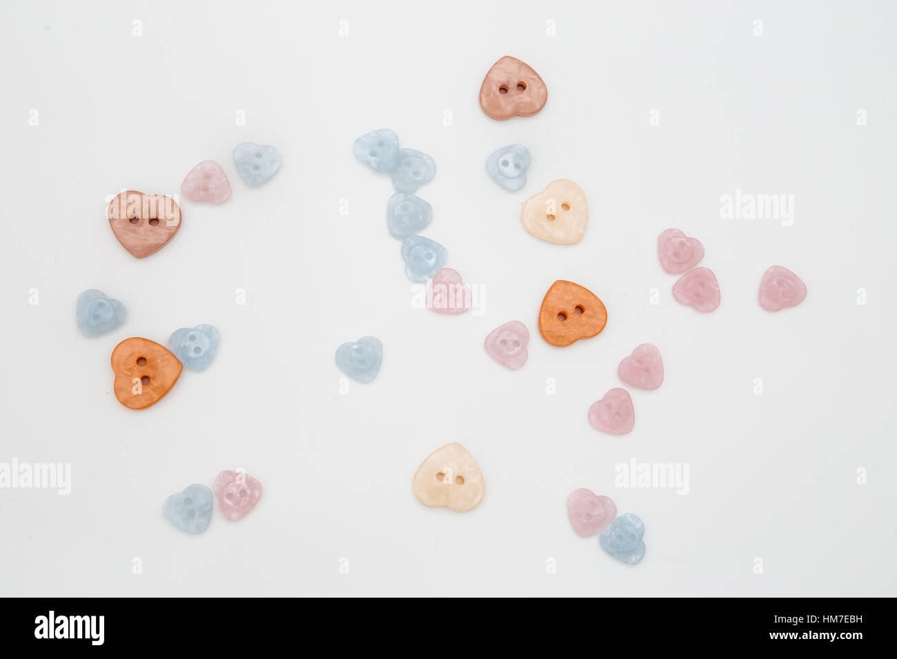 beautiful collection of various sewing button on white background Stock ...