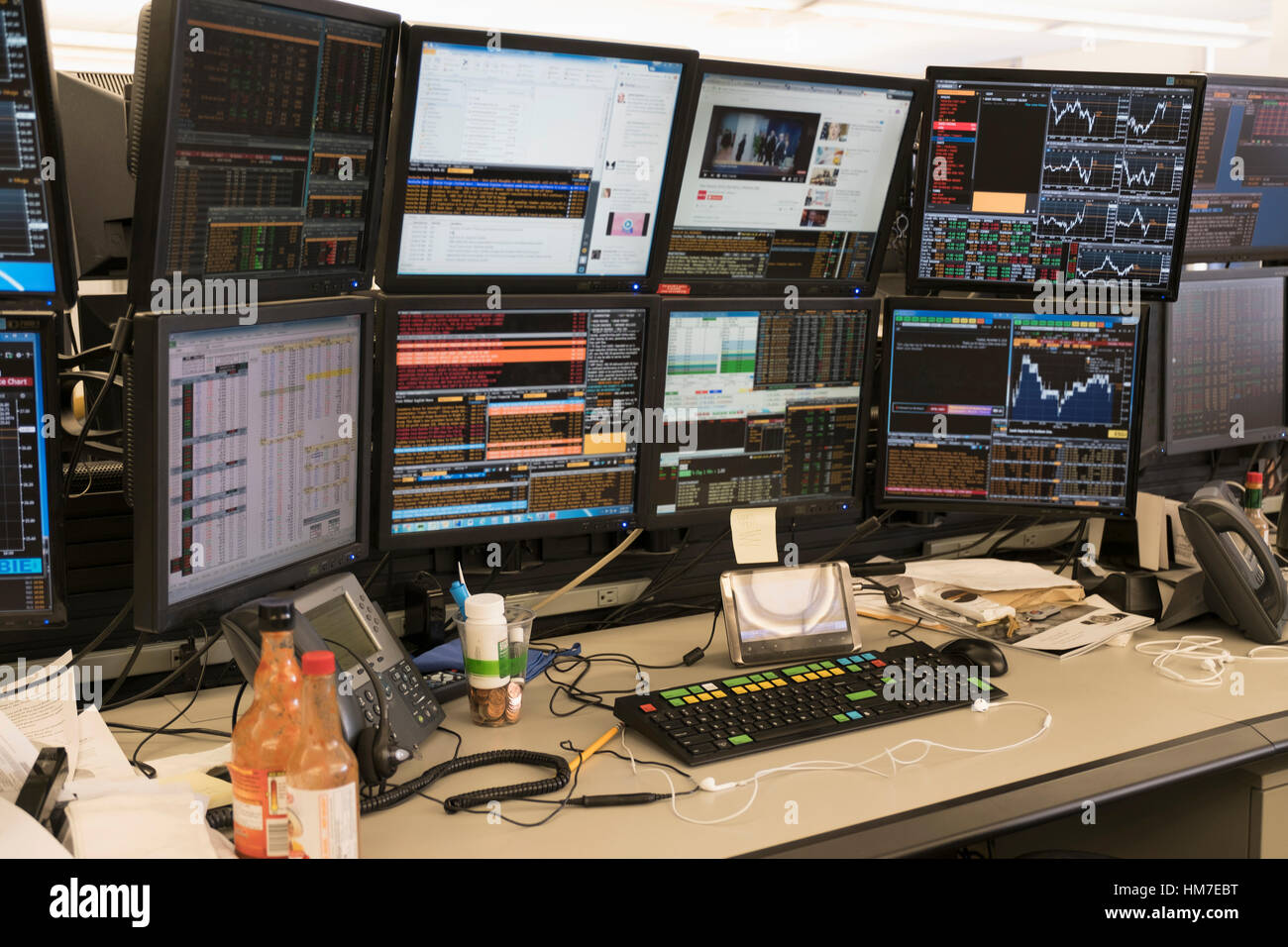 Desk with arrangement of computer monitor Stock Photo - Alamy