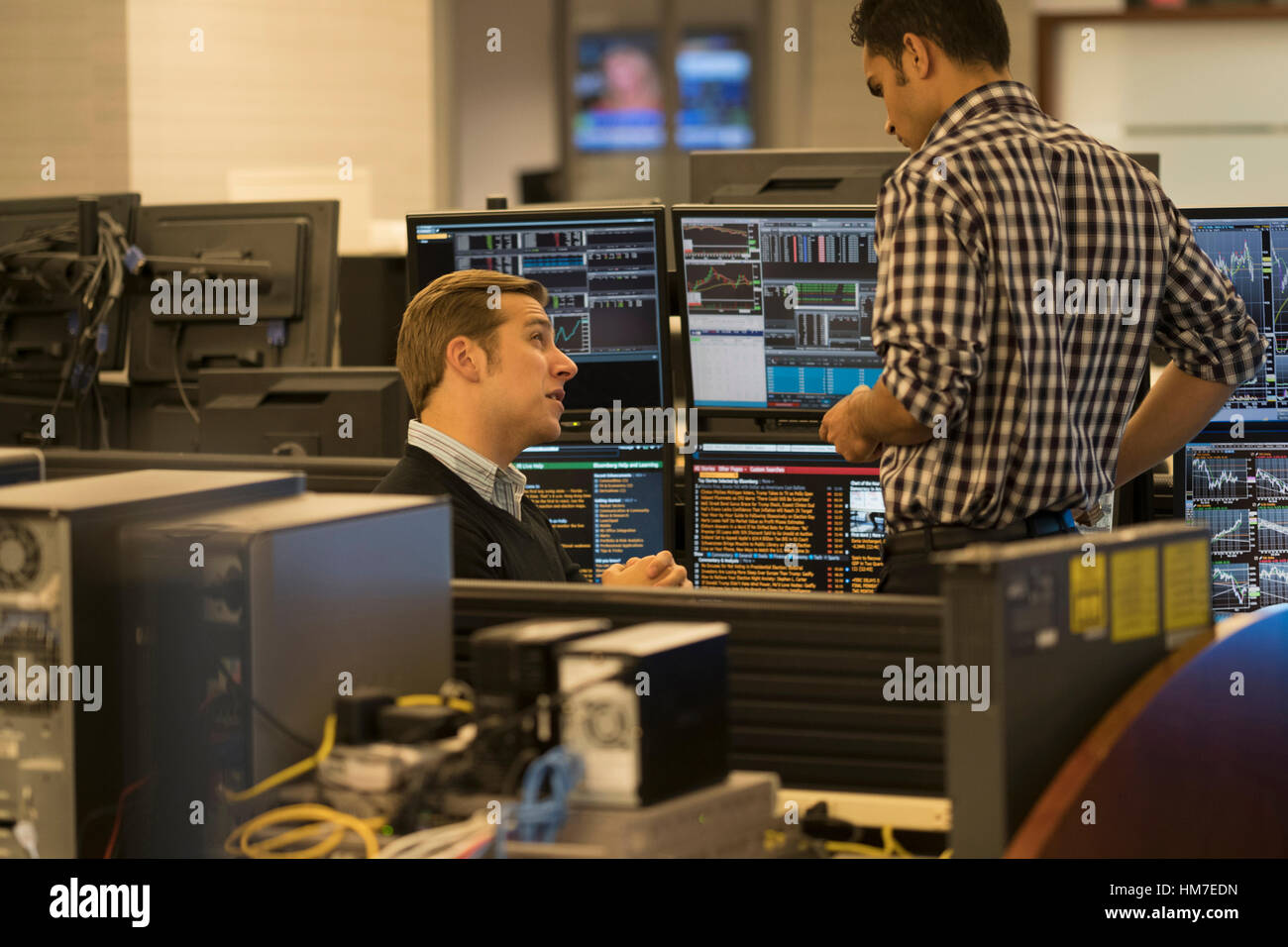 Young traders working in stock market Stock Photo - Alamy
