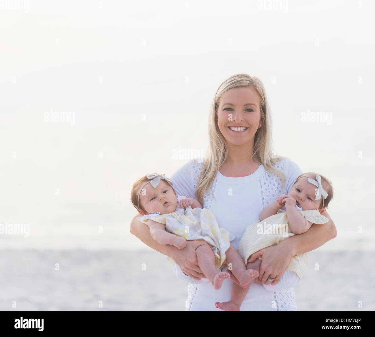 Two girls carrying hi-res stock photography and images - Alamy