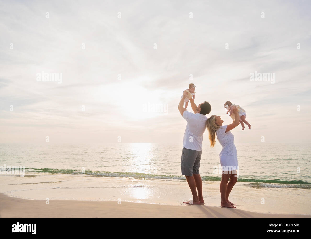 Two girls and their parents hi-res stock photography and images - Alamy