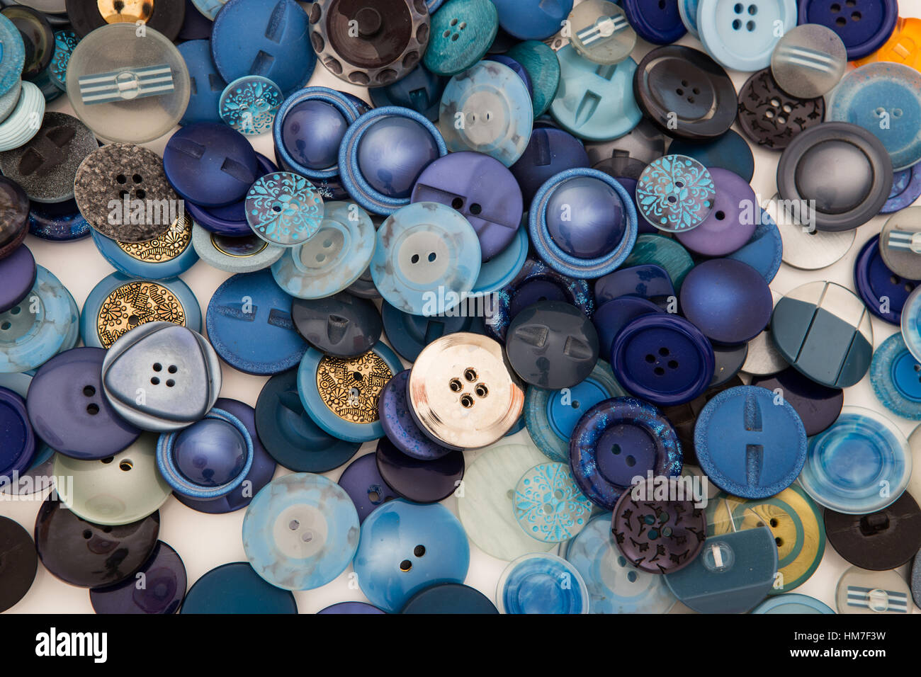 beautiful collection of various sewing button on white background Stock ...