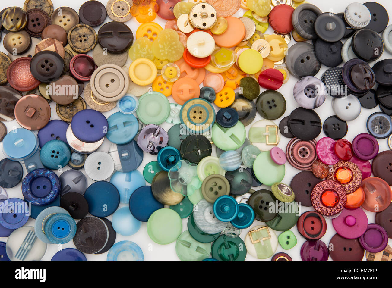 beautiful collection of various sewing button on white background Stock ...