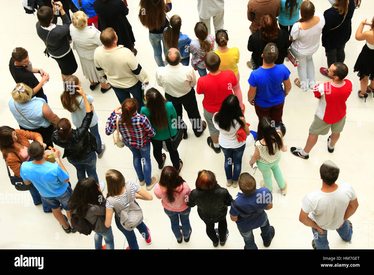 crowd of people standing back isolated on the white Stock Photo - Alamy