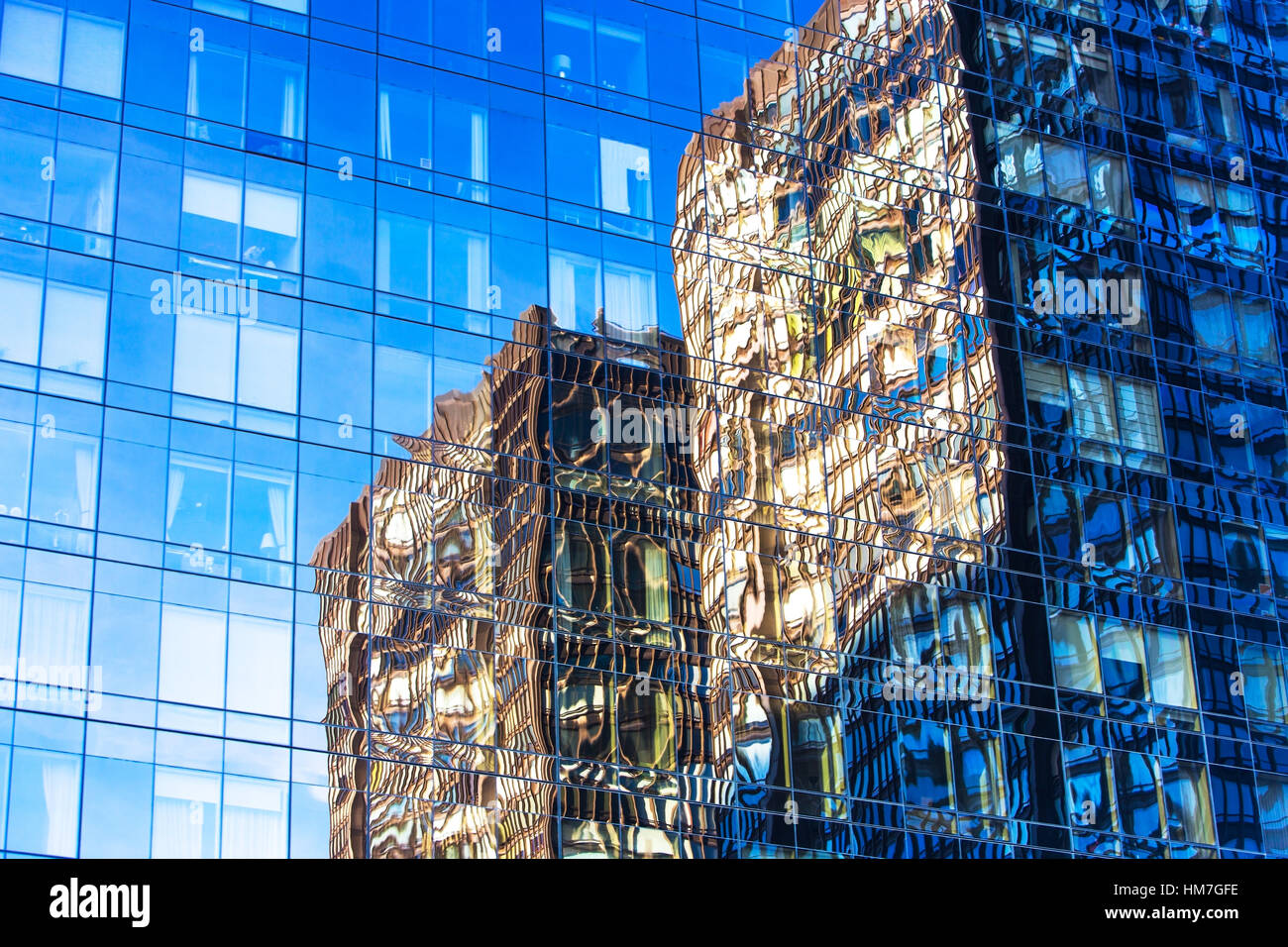 USA, New York, Distorted reflections in glass building Stock Photo - Alamy