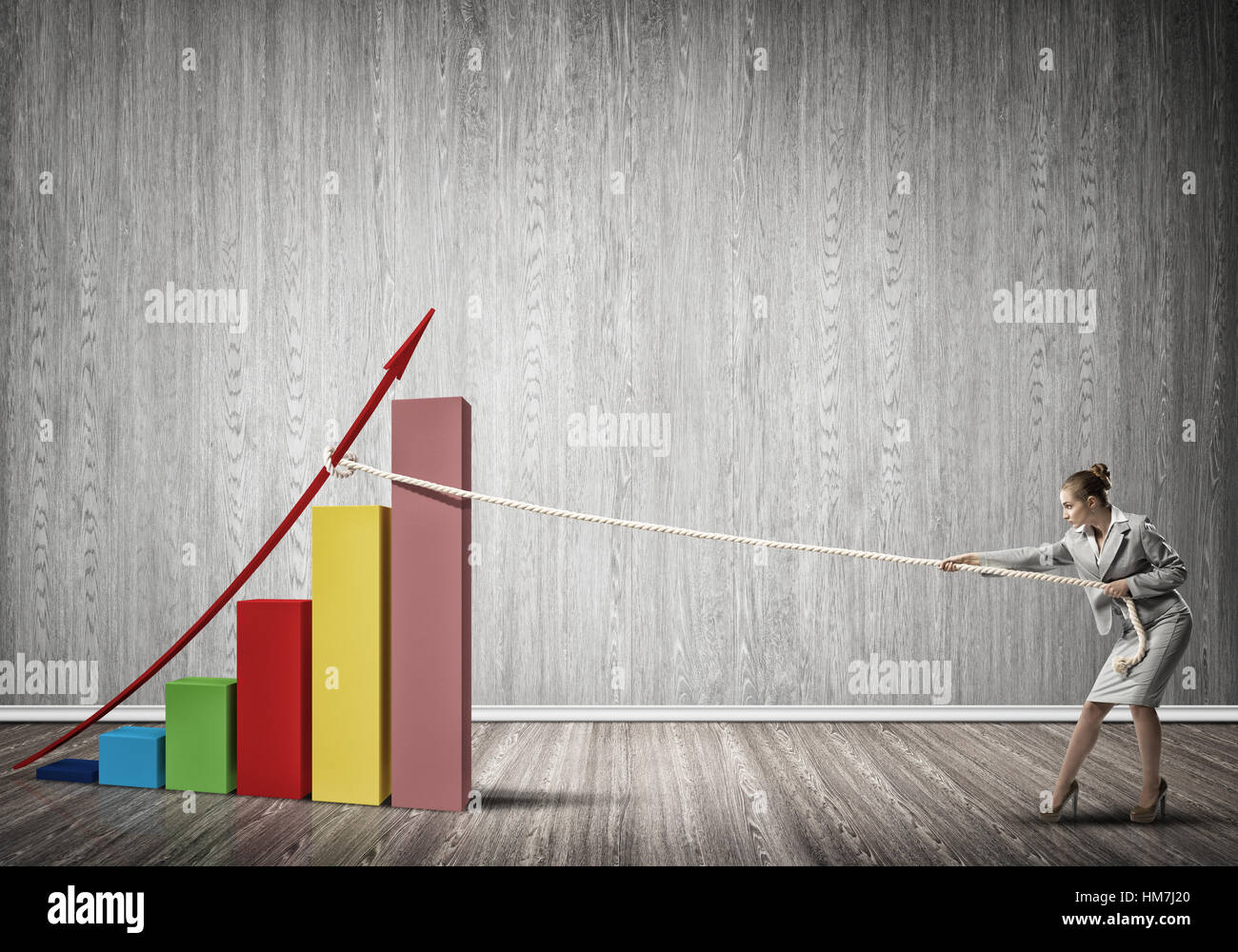 Businesswoman pulling graph with rope as symbol of power and control ...