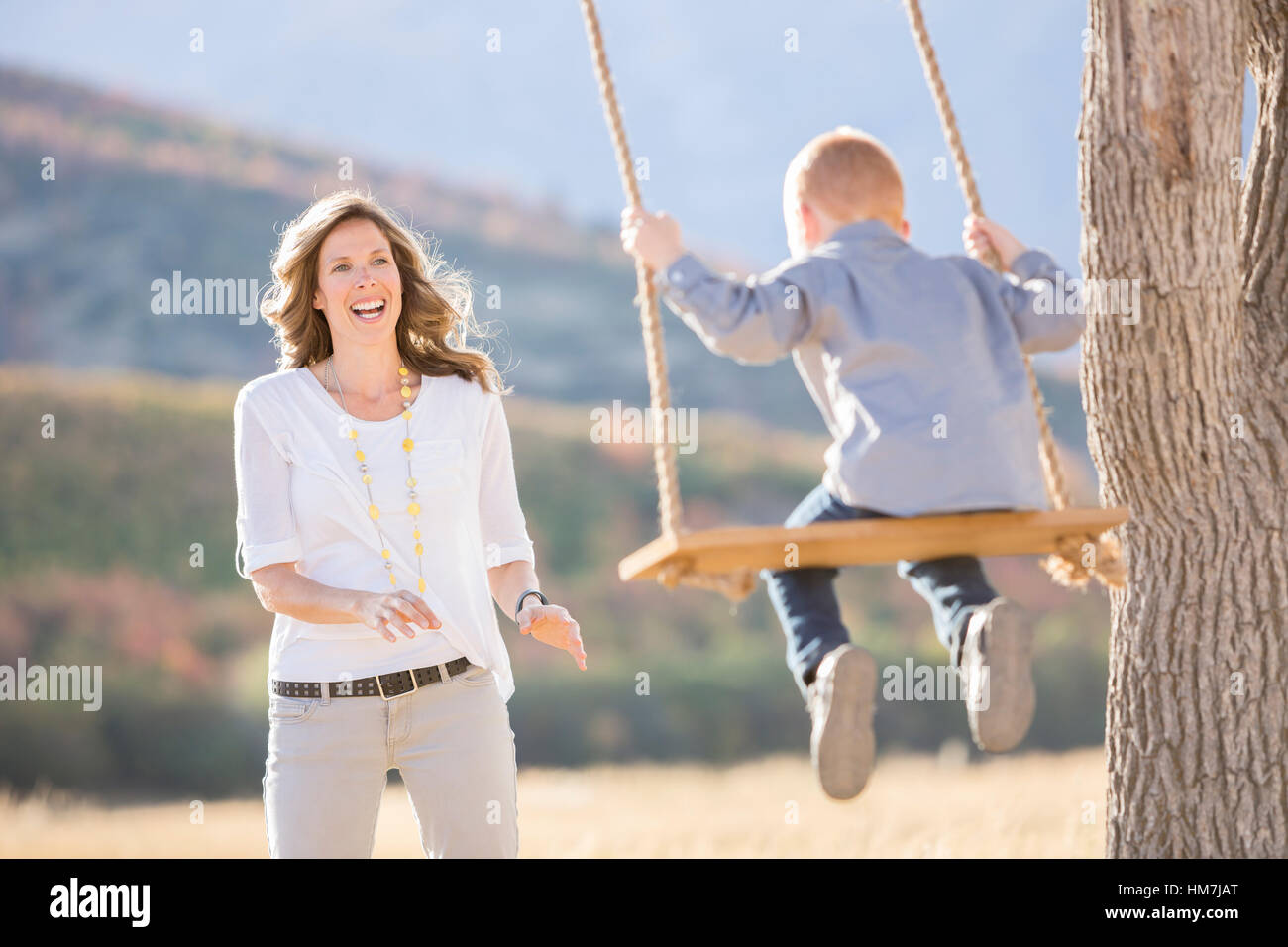 Child swing hi-res stock photography and images - Alamy