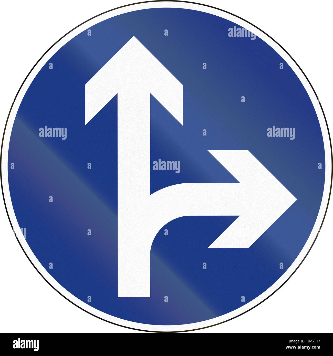 Slovenian mandatory direction sign - Go right or straight Stock Photo ...