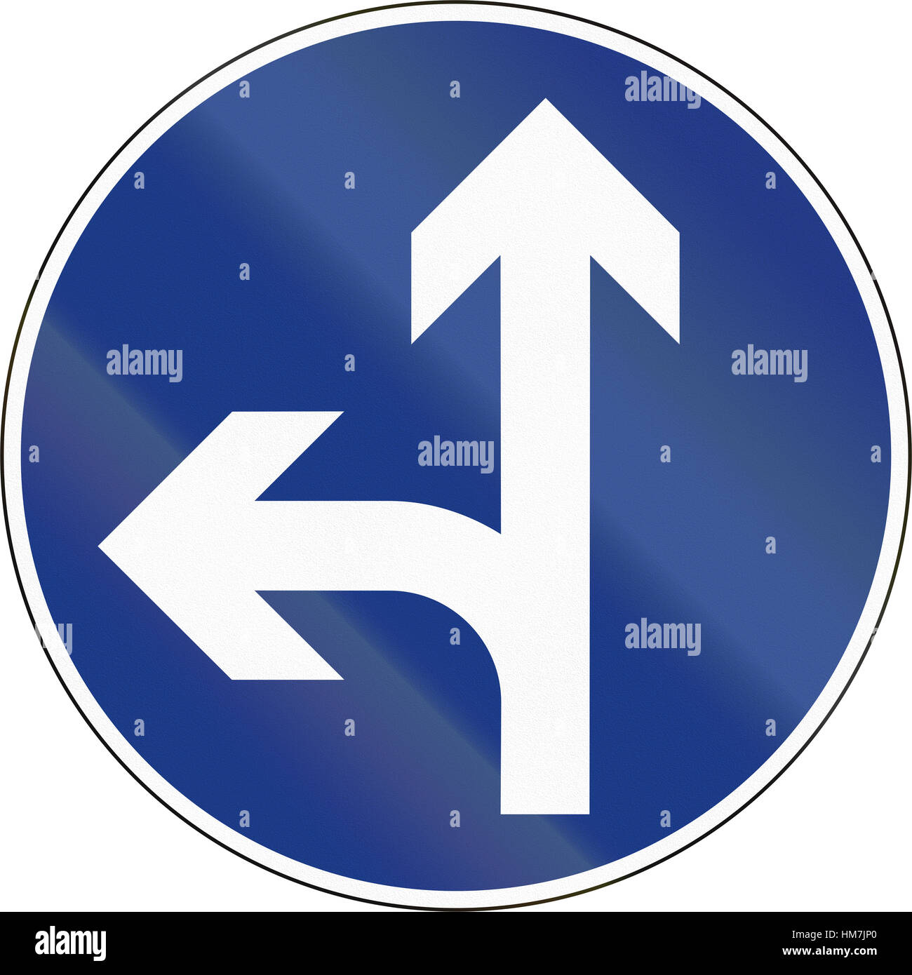 Slovenian mandatory direction sign - Go left or straight Stock Photo ...