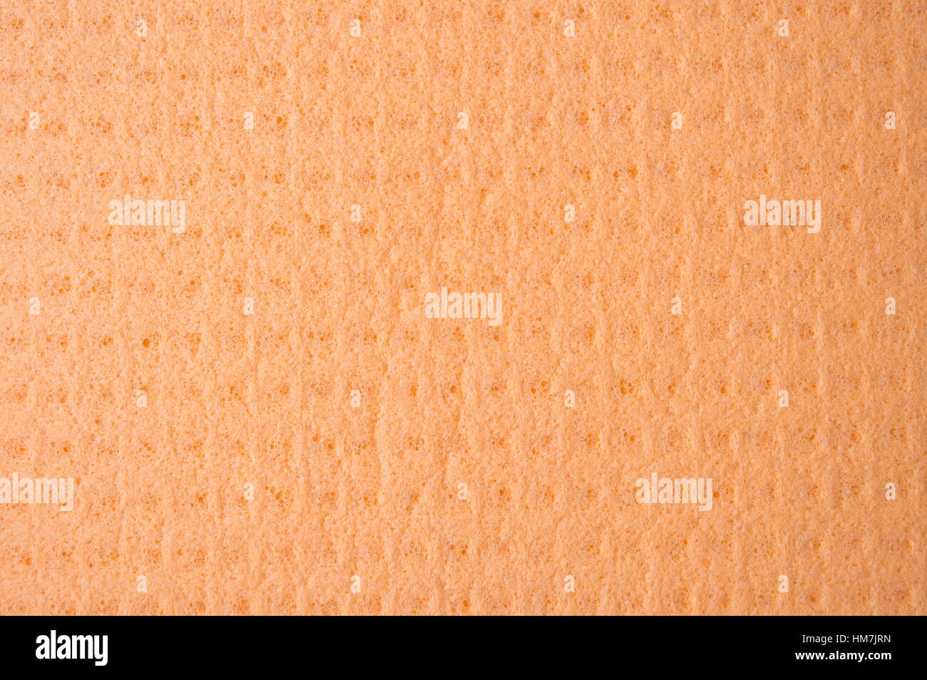 Orange cleaning cloth background pattern close up Stock Photo - Alamy