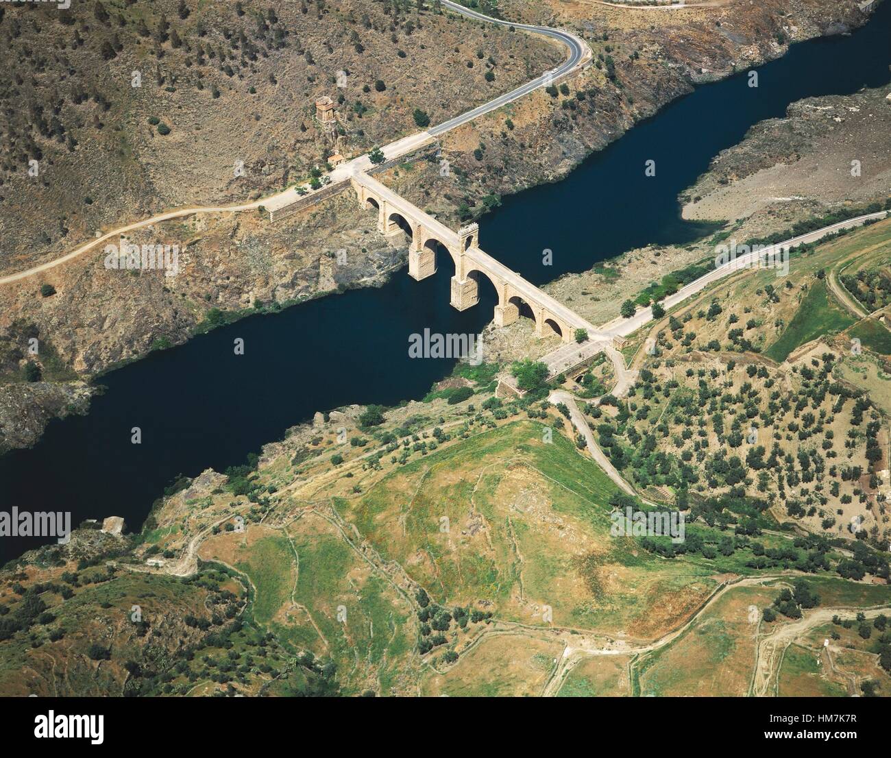 Aerial view of the Roman bridge over the Tagus river, Alcantara ...