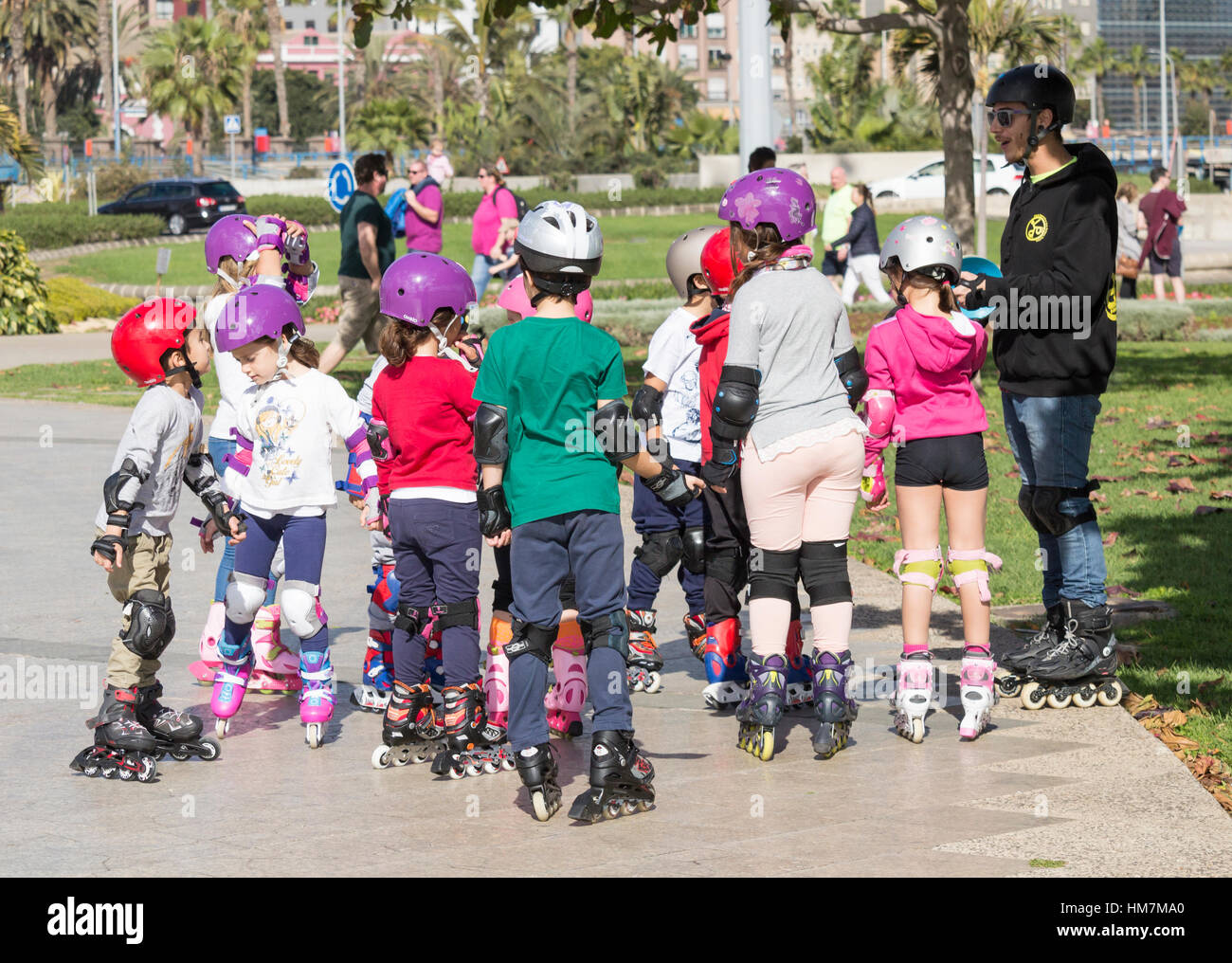 Children having Rollerblading lesson in Spain Stock Photo - Alamy