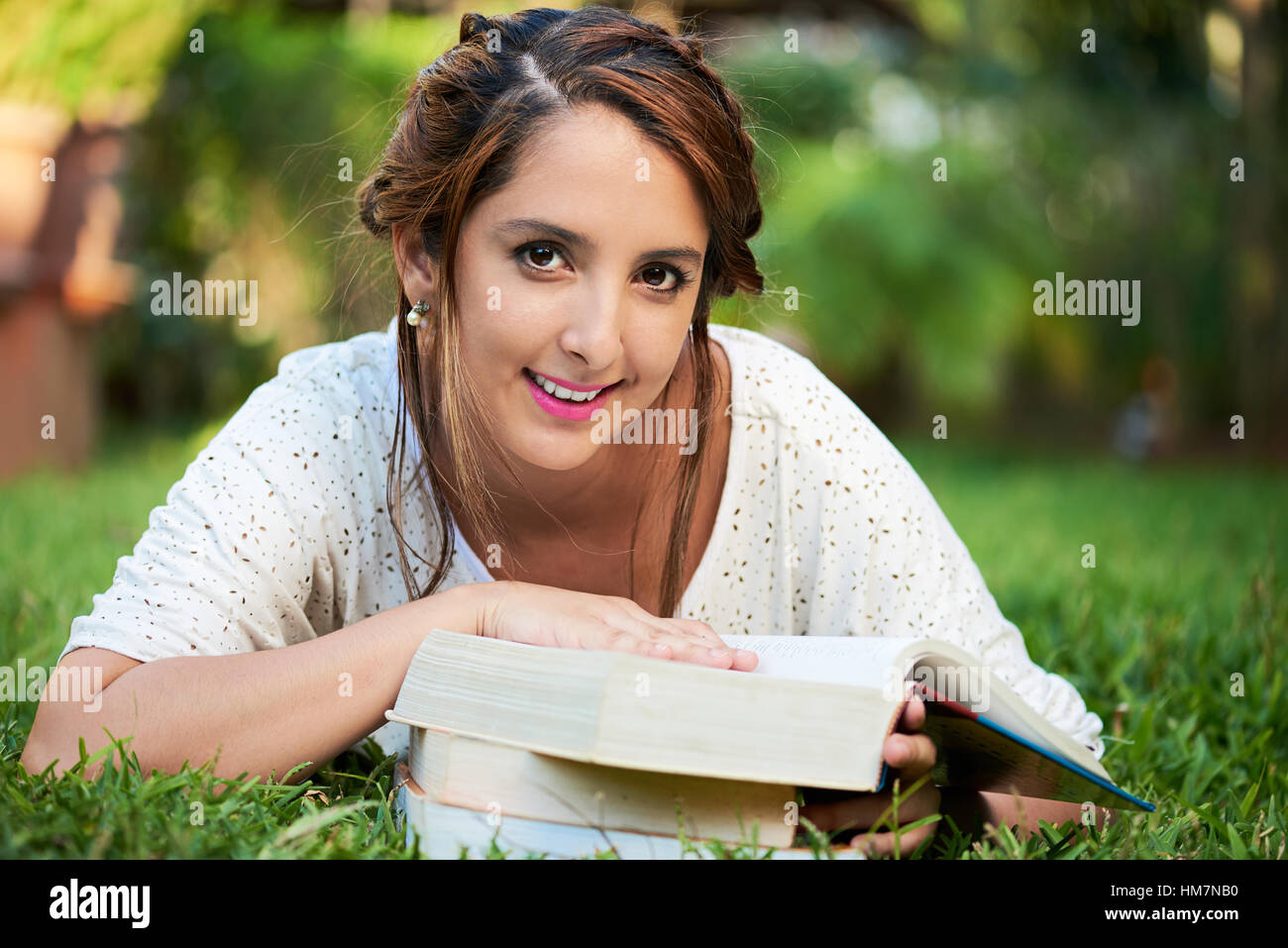 Smiling girl books lay on hi-res stock photography and images - Alamy