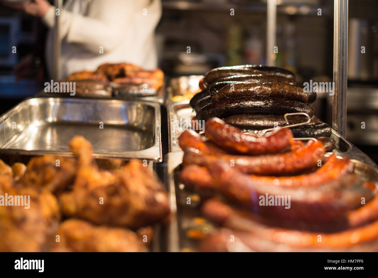 Plates full of sausages inside a lo Stock Photo - Alamy