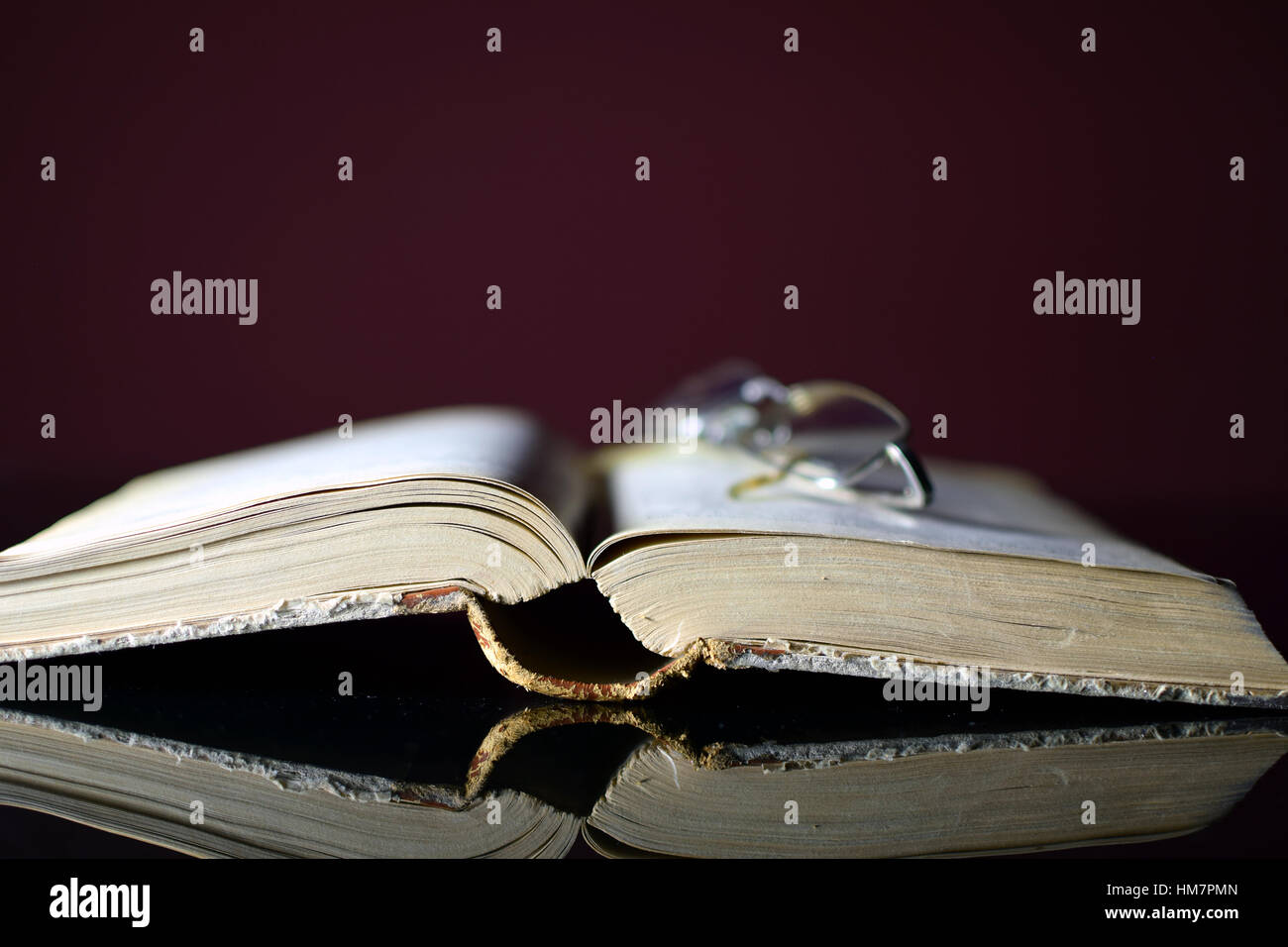 Open book with glasses hi-res stock photography and images - Alamy