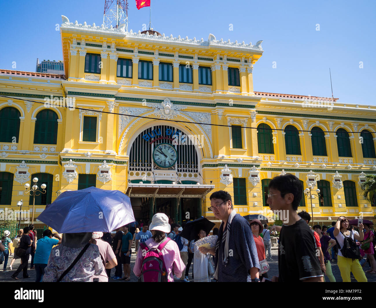 Saigon Central Post Office designed by Gustave Eiffel. Local people and ...