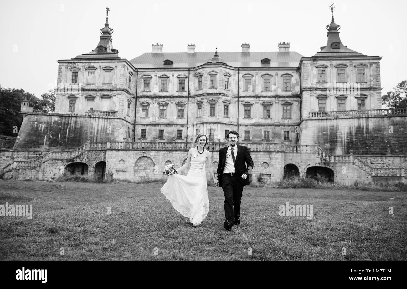 Loving wedding couple at their happy wedding day background old vintage ...