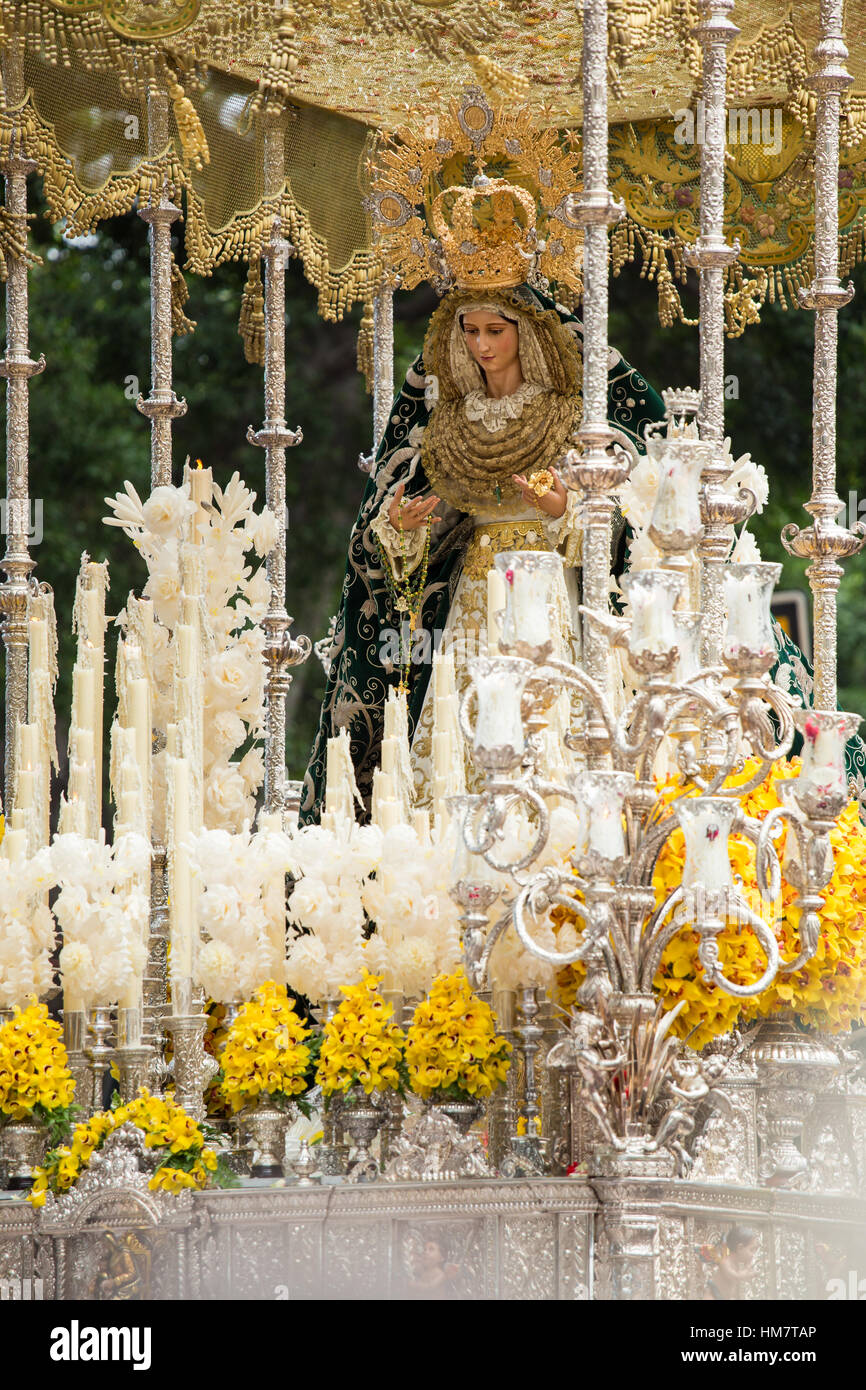 Virgin Mary on palm sunday (easter week). Heavy figure that is moved by ...