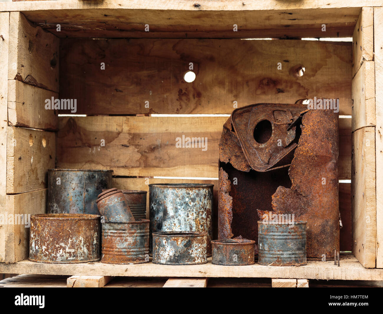 Rusted Aluminum Cans inside Wooden Container Stock Photo - Alamy