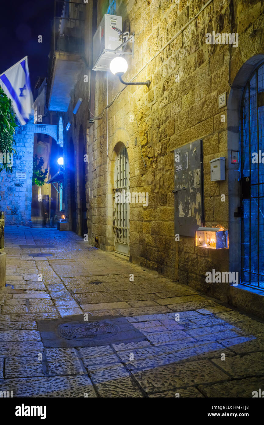 JERUSALEM, ISRAEL - DECEMBER 29, 2016: Alley with a display of ...