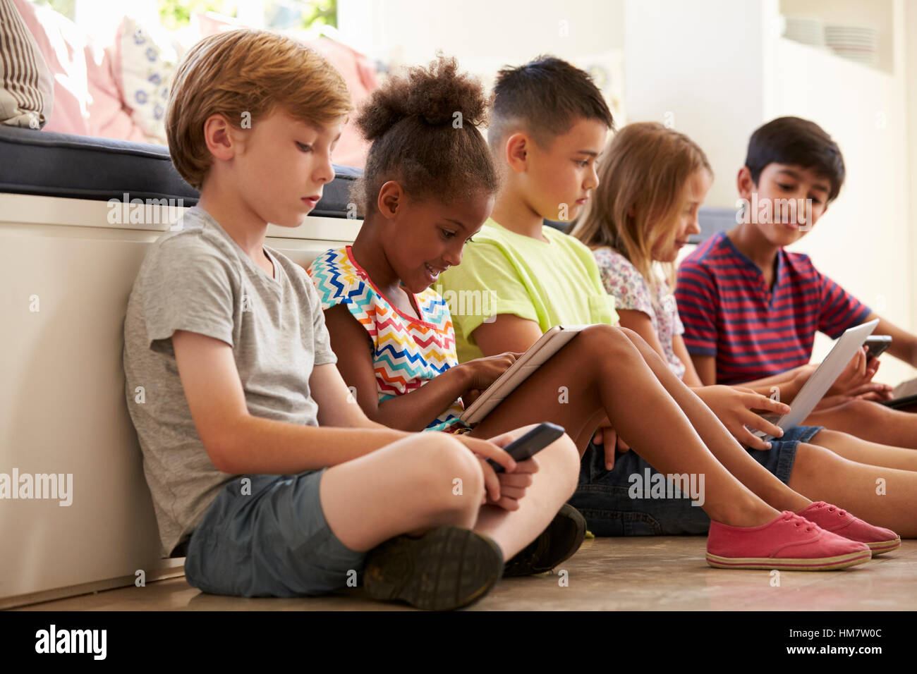 Kids Sitting On Floor