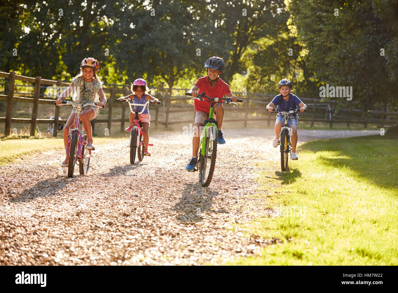 Four Children On Cycle Ride In Countryside Together Stock Photo - Alamy
