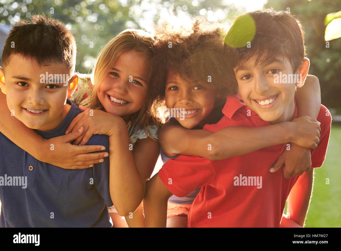 Portrait Of Four Children Having Fun Outdoors Together Stock Photo - Alamy
