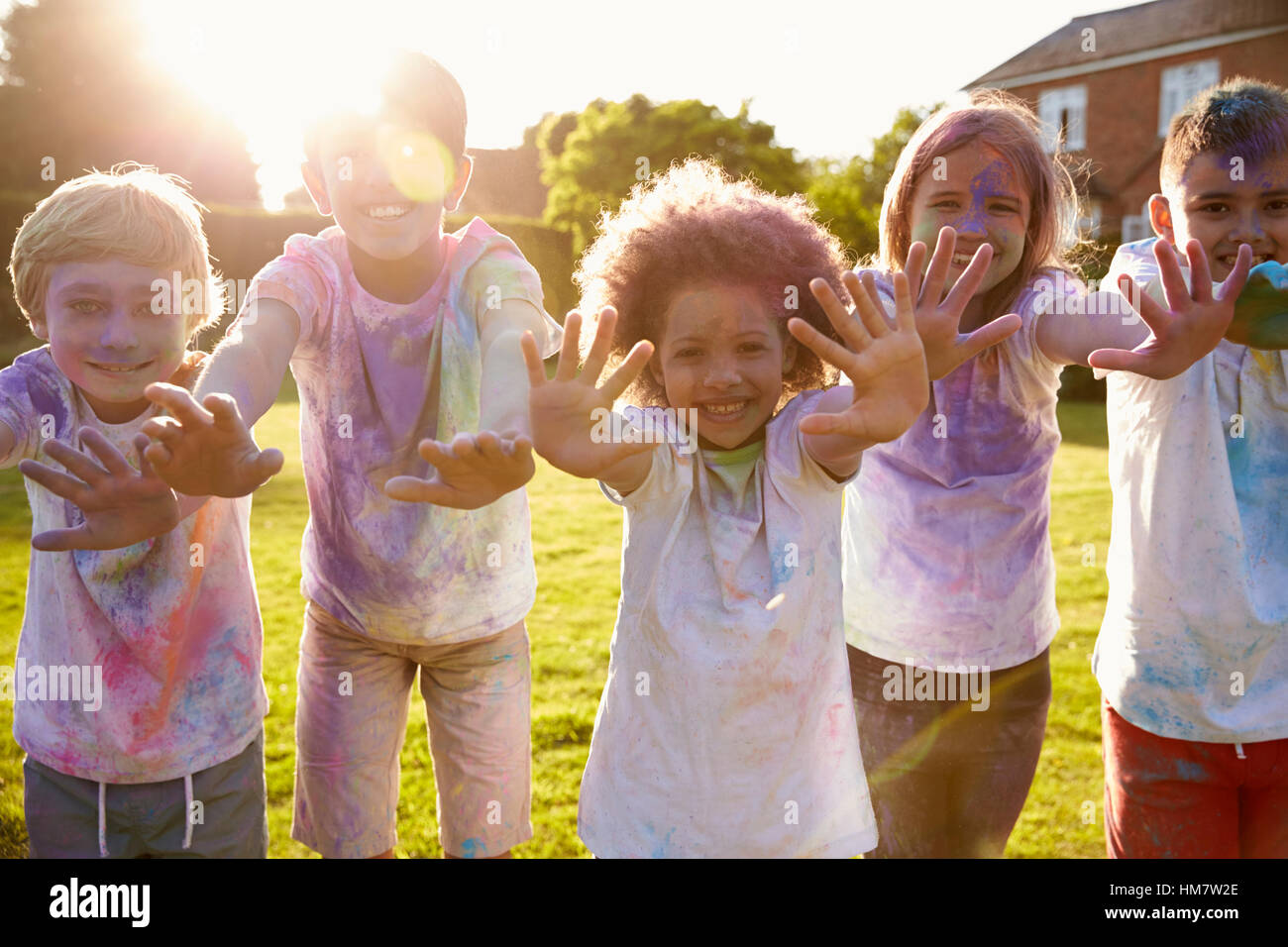 Portrait Of Children Celebrating Holi Festival Stock Photo - Alamy