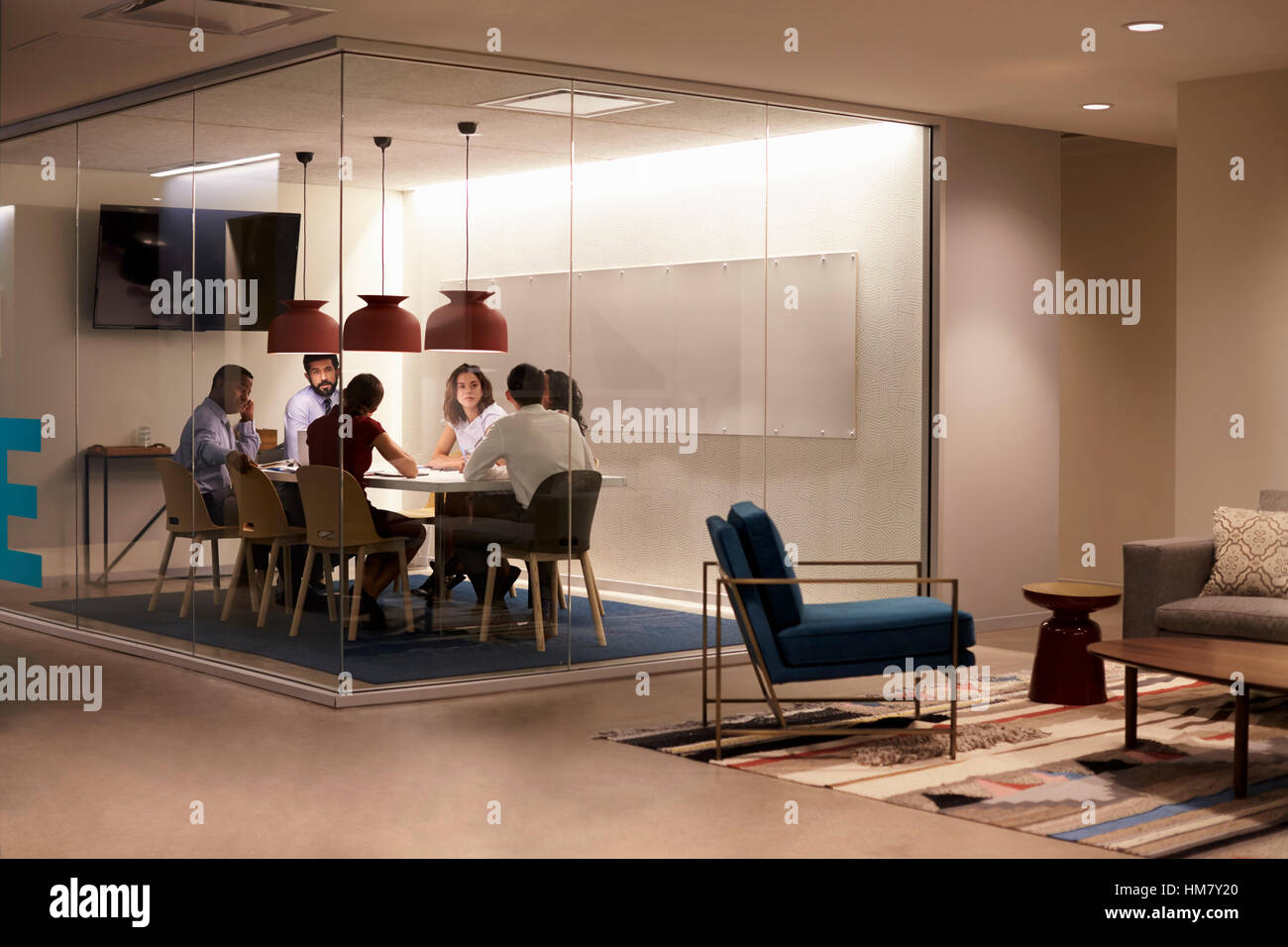 Team in a meeting cubicle at a big corporate business Stock Photo - Alamy