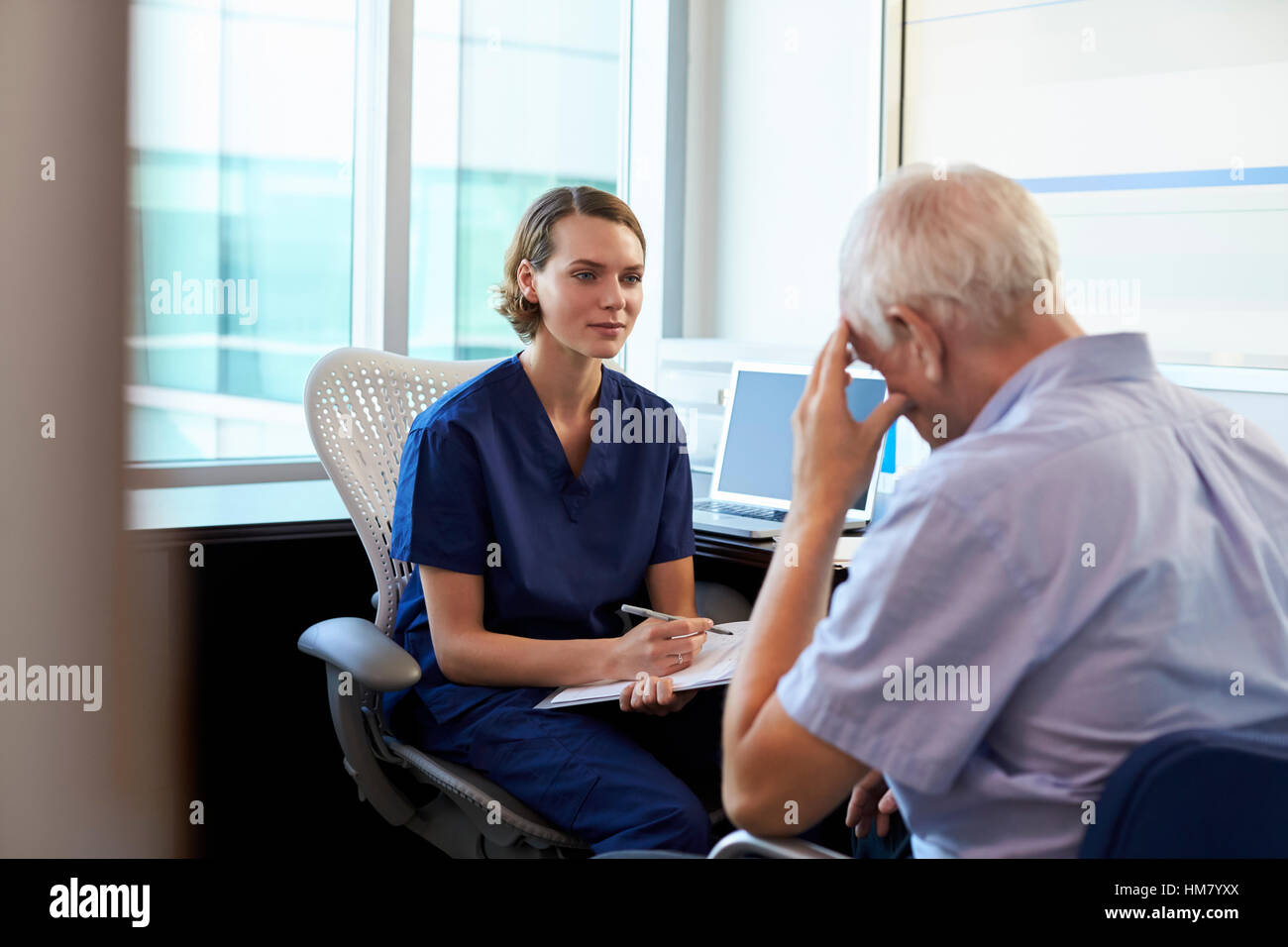 Doctor In Consultation With Depressed Male Patient Stock Photo - Alamy