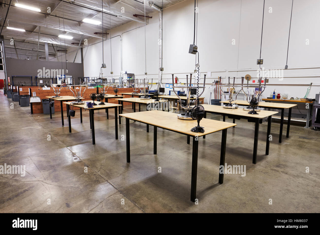 Interior Of Factory With Empty Work Benches Stock Photo - Alamy