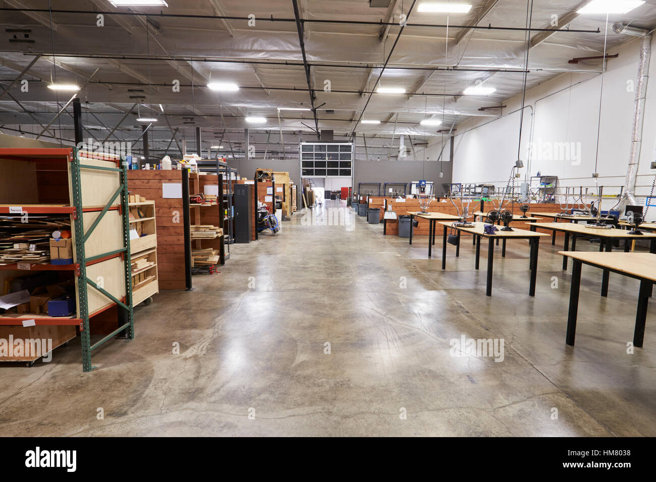 Interior Of Factory With Empty Work Benches Stock Photo - Alamy