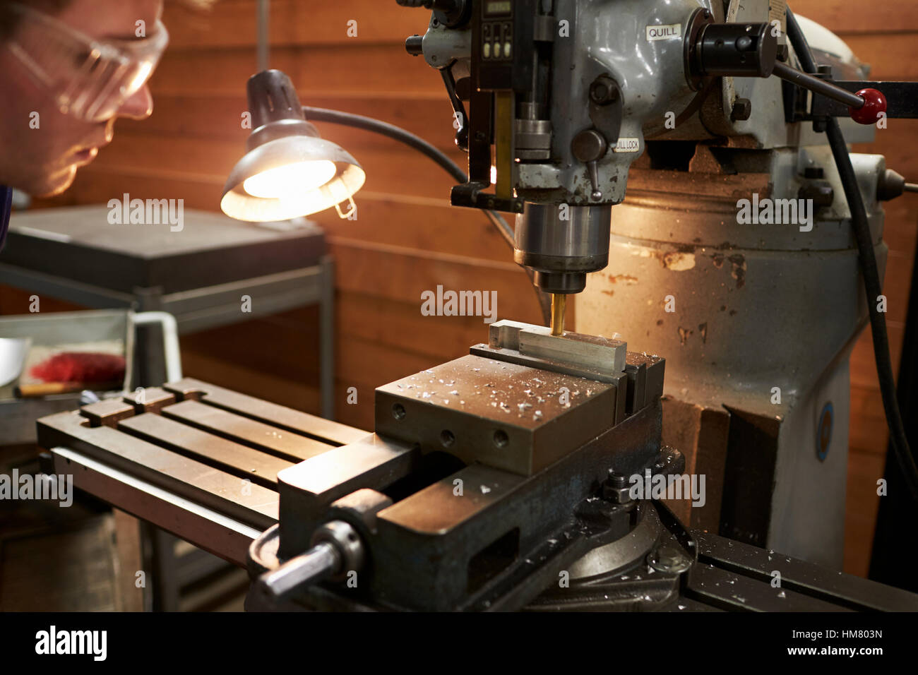 Male Engineer Using Drill In Factory Stock Photo - Alamy