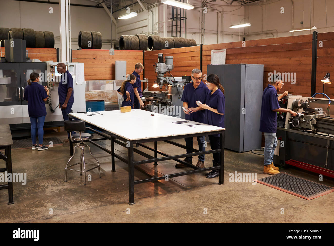 Worker working on factory machines hi-res stock photography and images ...