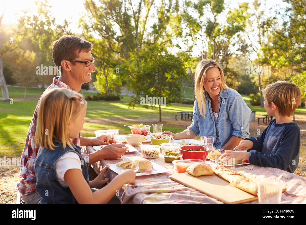 Teen girl sitting picnic table hi-res stock photography and images - Alamy