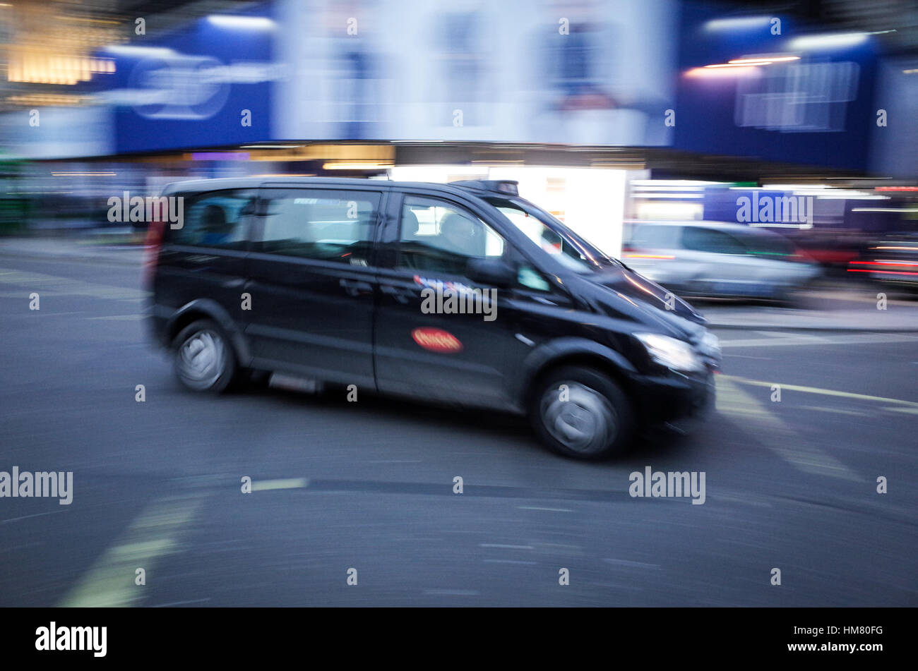 Mercedes Vito London Taxi in Piccadilly Circus - Motion Blur Stock ...