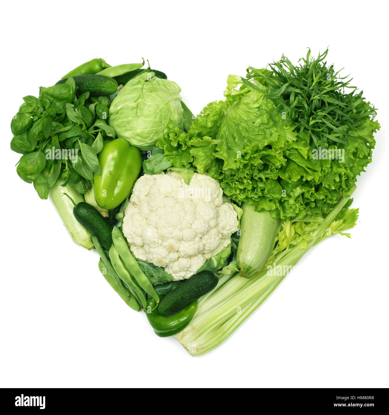 Pile of vegetables shaped as heart isolated on white background Stock ...
