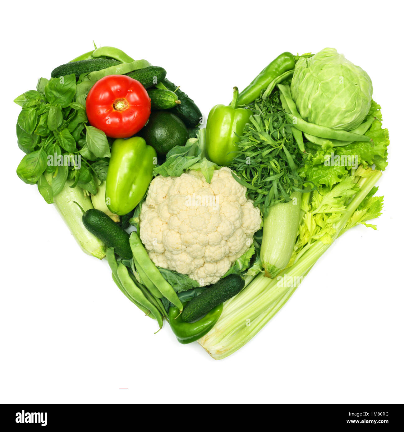 Love vegetables concept, pile of vegetables shaped as heart isolated on ...