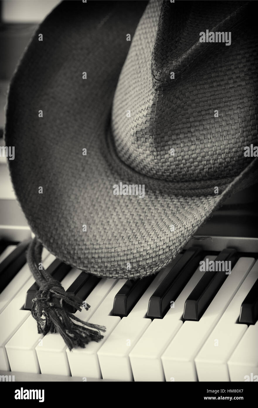 Cowboy hat on Piano keys Close up Stock Photo - Alamy