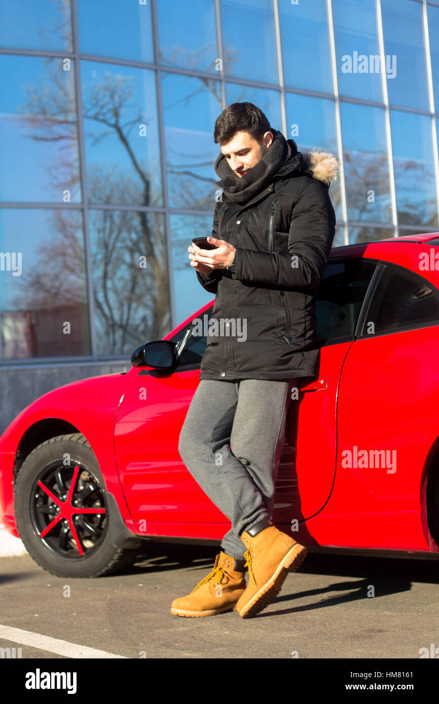 Happy handsome man near car hi-res stock photography and images - Alamy