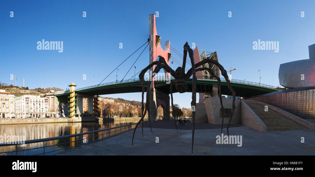 Spain: skyline of Bilbao and Nervion River with La Salve Bridge and the ...