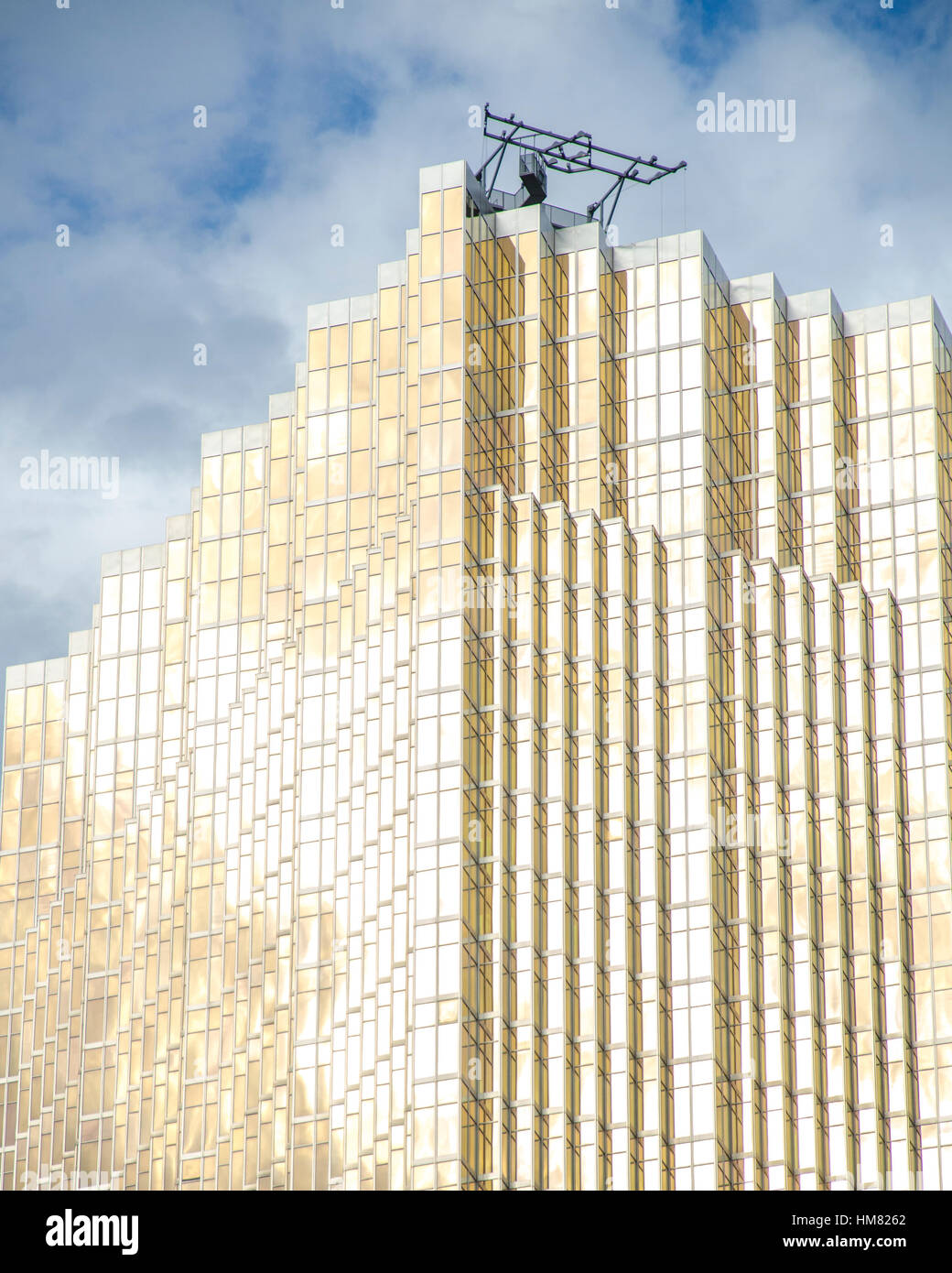 A picture of a bright yellow building against the sky. Taken in ...