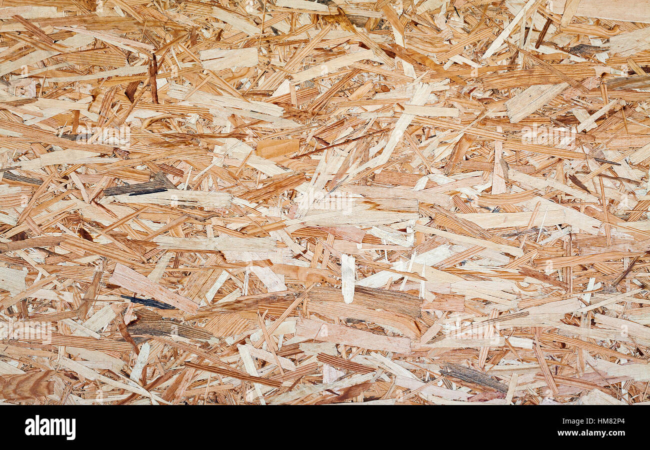 Texture of a chipboard wooden material, closeup view Stock Photo - Alamy