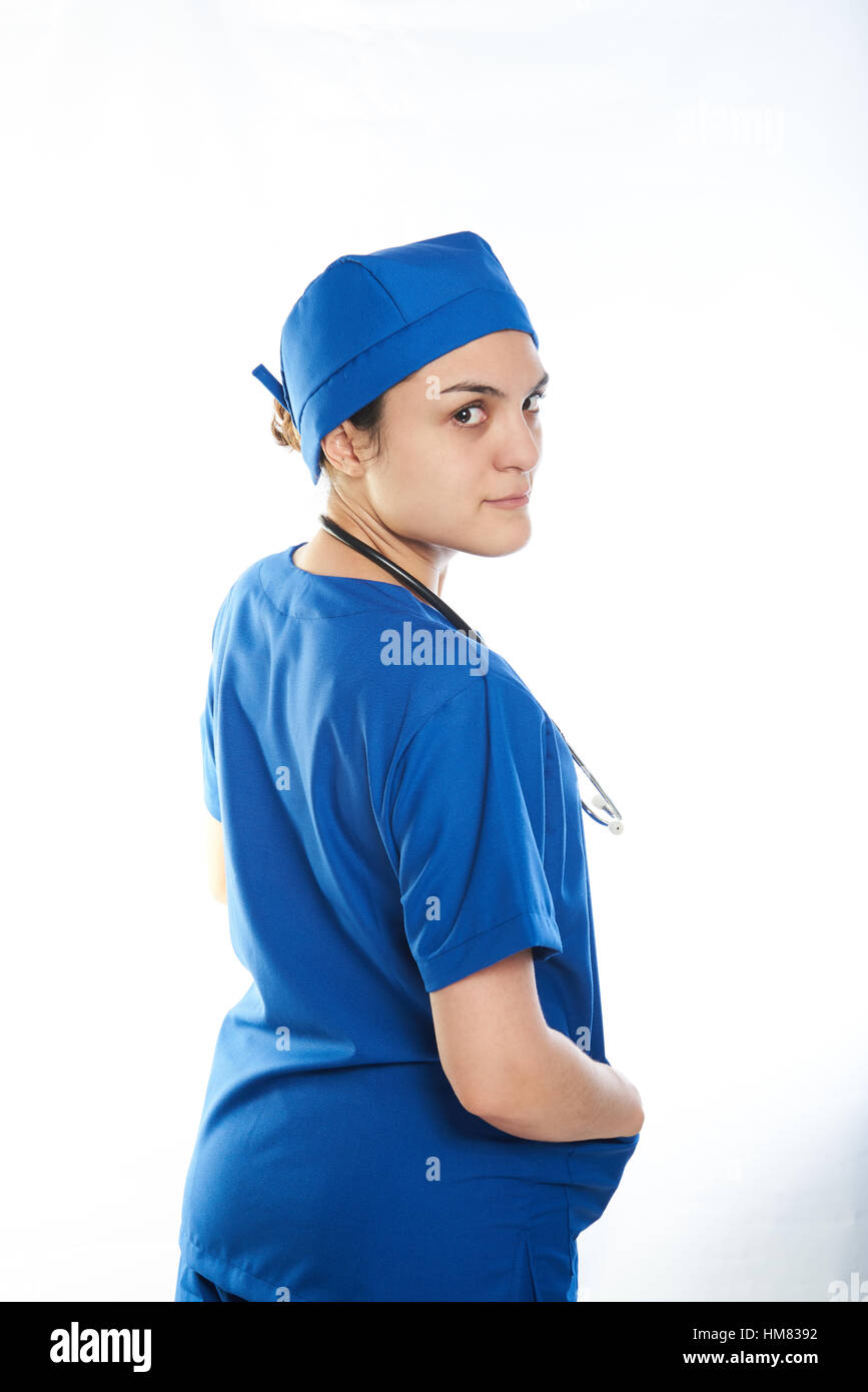 female doctor looking backwards on a white background Stock Photo - Alamy