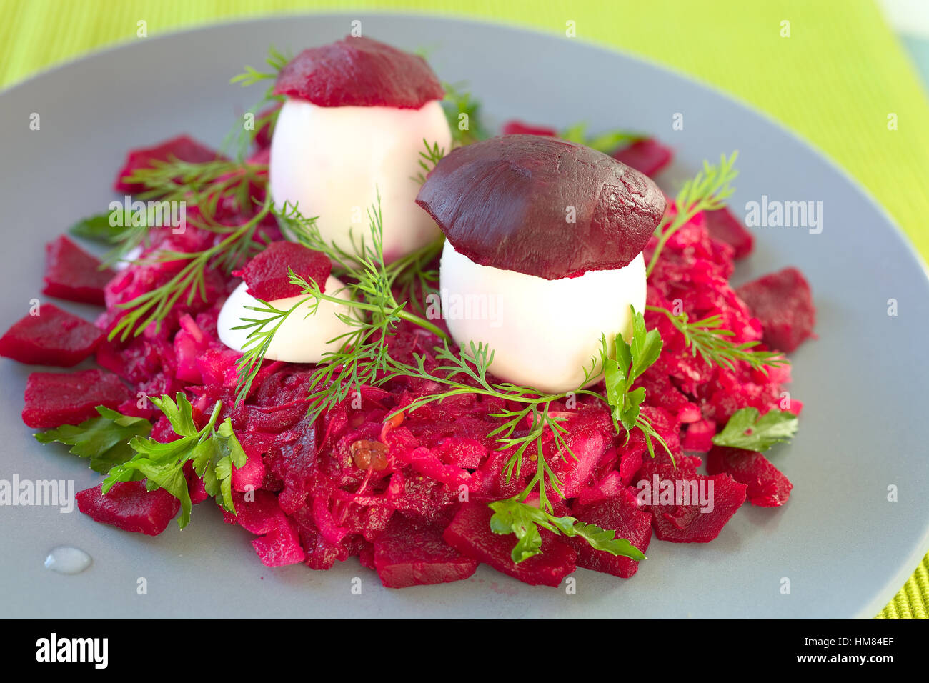 Beetroot salad and funny mushrooms Stock Photo - Alamy