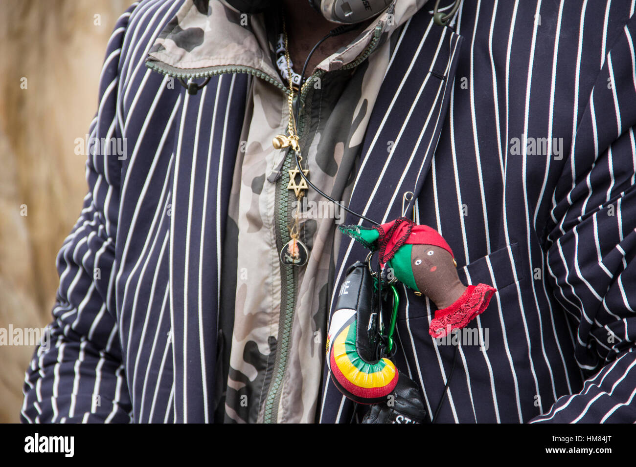 Accessories on a man's jacket Stock Photo - Alamy